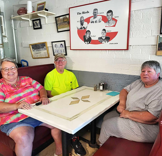 The regulars' table&mdash;where coffee refills are automatic and everyone knows which local high school team needs more support this season.