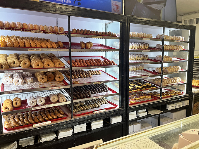 A wall of possibilities that makes choosing just one nearly impossible. This display case has probably witnessed thousands of "I'll take that one... no, that one" moments.