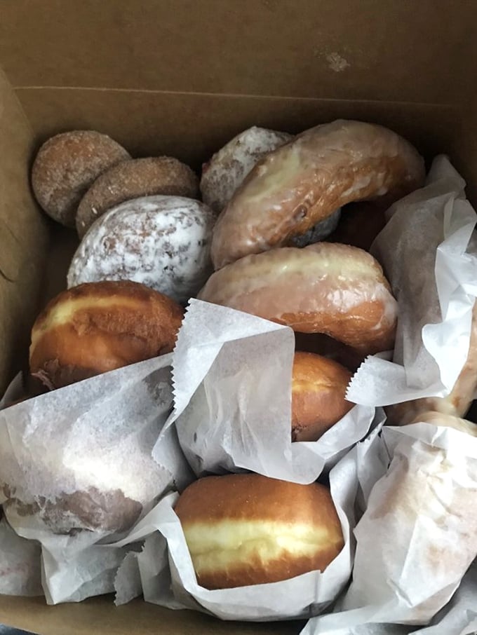 A box of happiness, to go! These assorted donuts are like a party in cardboard &ndash; each one a different dance move for your taste buds.