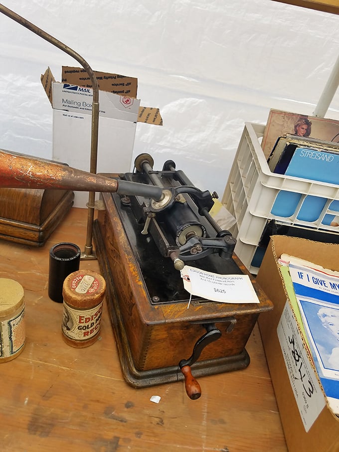 Vinyl enthusiasts, rejoice! This vintage phonograph is ready to spin your favorite tunes. Time to dust off those Beatles albums and get groovin'!
