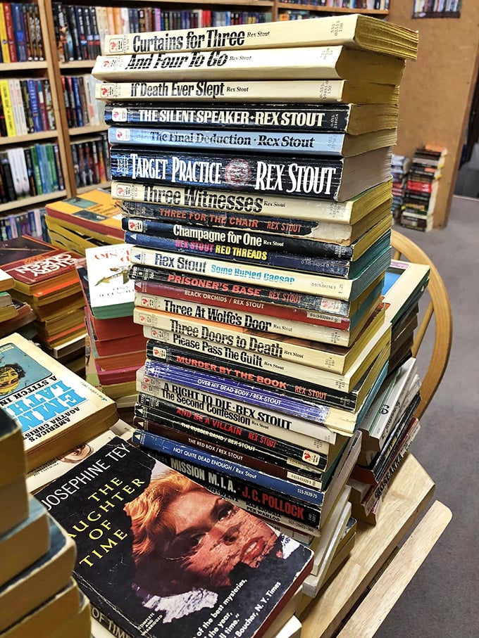 Mystery books stacked higher than my pile of unsolved "who ate the last cookie" cases. The plot thickens... and so does the dust.