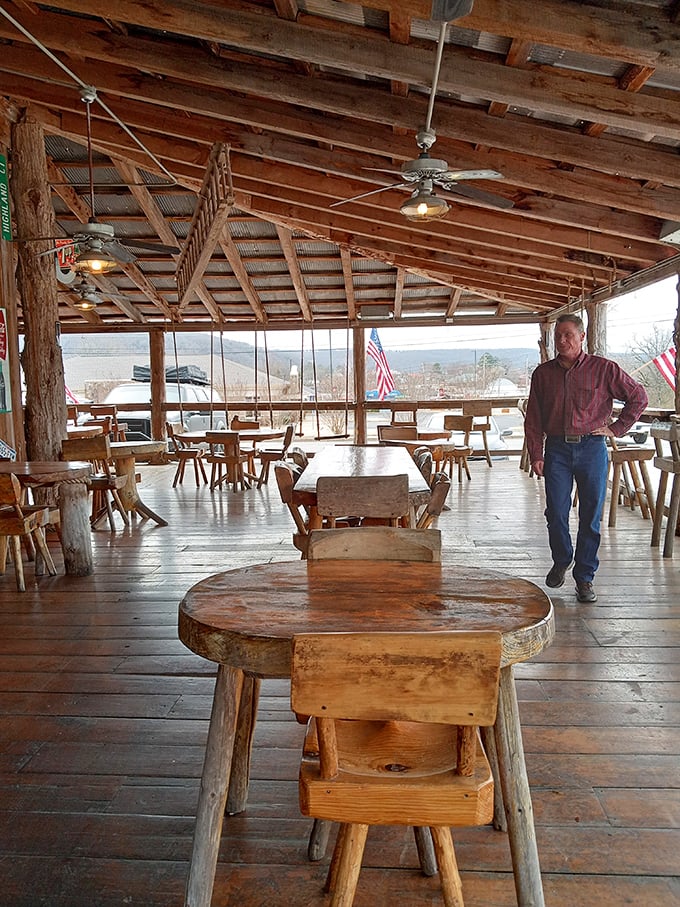 The covered porch dining area offers Ozark views with your meal&mdash;nature's television playing while you feast on Arkansas comfort food.