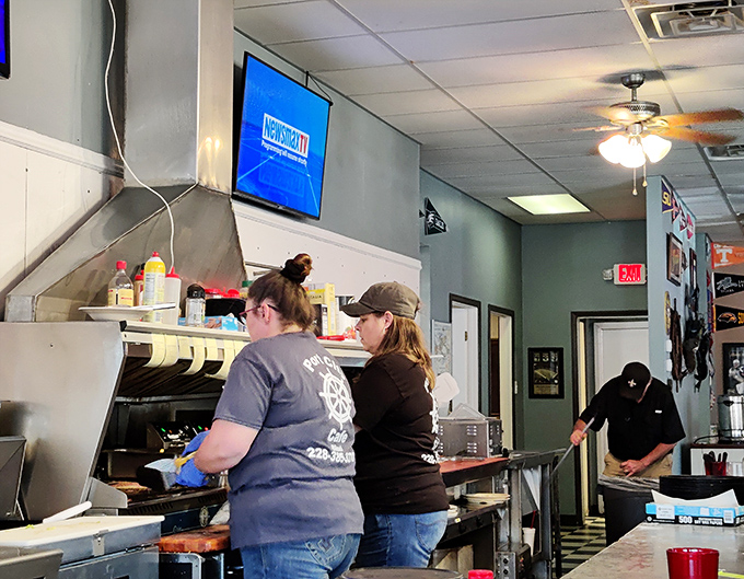Behind the scenes: Where breakfast magic happens. These culinary wizards turn simple ingredients into morning masterpieces.