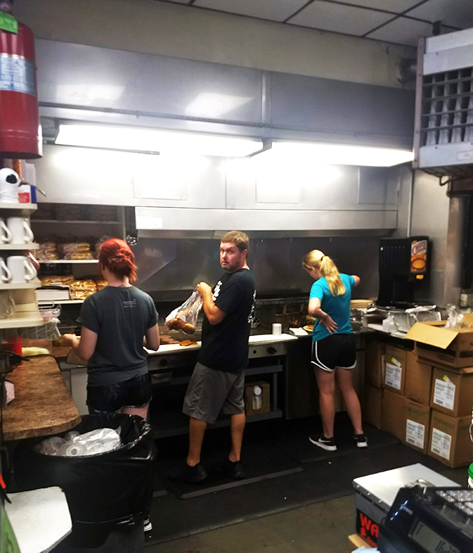 Behind the scenes magic! Wally's kitchen crew works their culinary wizardry, turning simple ingredients into crave-worthy classics.