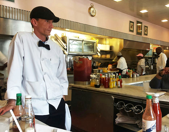 Bow tie brilliance! These dapper diner maestros orchestrate a symphony of sizzles, flips, and perfectly timed wisecracks.
