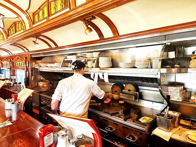 Behind the scenes of breakfast magic. This chef's not just cooking; he's orchestrating a symphony of sizzles and aromas.