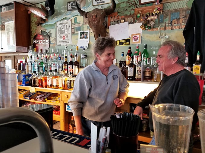 The wizards behind the grill! These friendly faces are the keepers of the flame, guardians of the secret burger recipe.