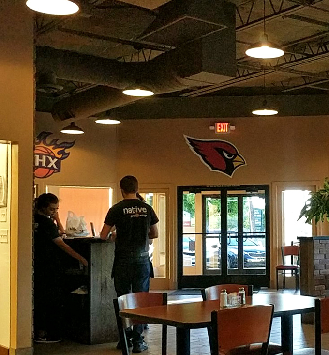 The unsung heroes of wing perfection. These folks could teach a masterclass in sauce distribution and customer satisfaction.