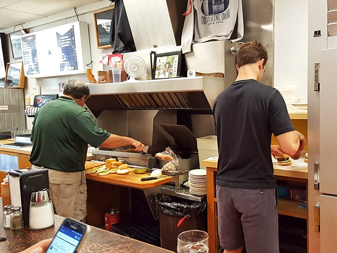 Masters of the grill at work. These folks could flip burgers in their sleep – but thankfully, they're wide awake.