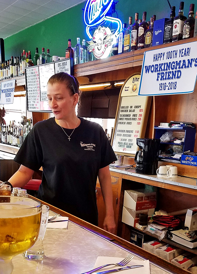 The unsung heroes of burger bliss. These folks could probably flip patties in their sleep, but let's hope they don't try.