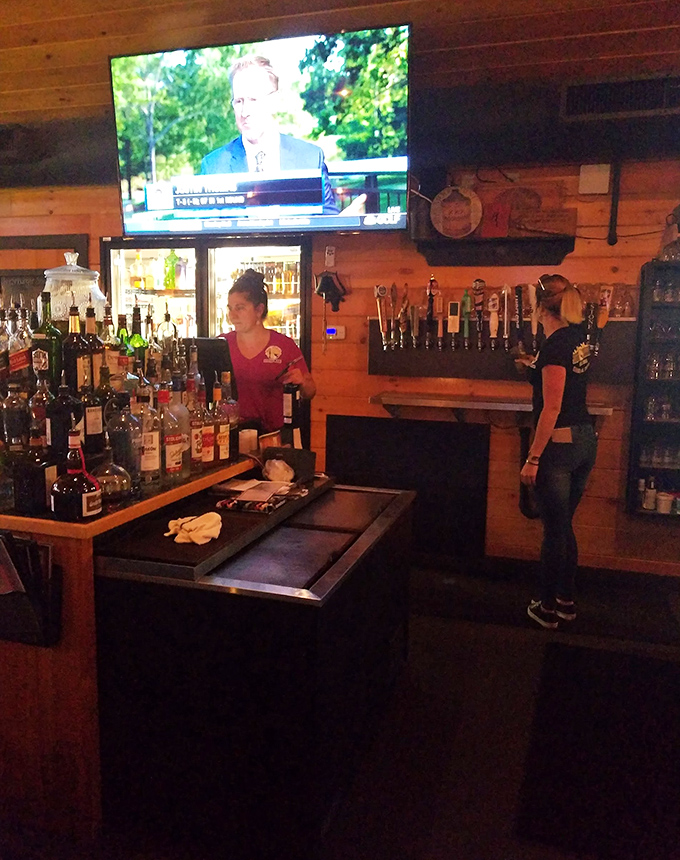 The bar area: where liquid comfort meets comfort food. It's like a hug for your insides, but with more alcohol.