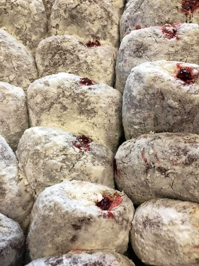 The bakery counter: Where dreams come true and diets go to die. Resistance is futile, so grab a number and prepare for pastry paradise.