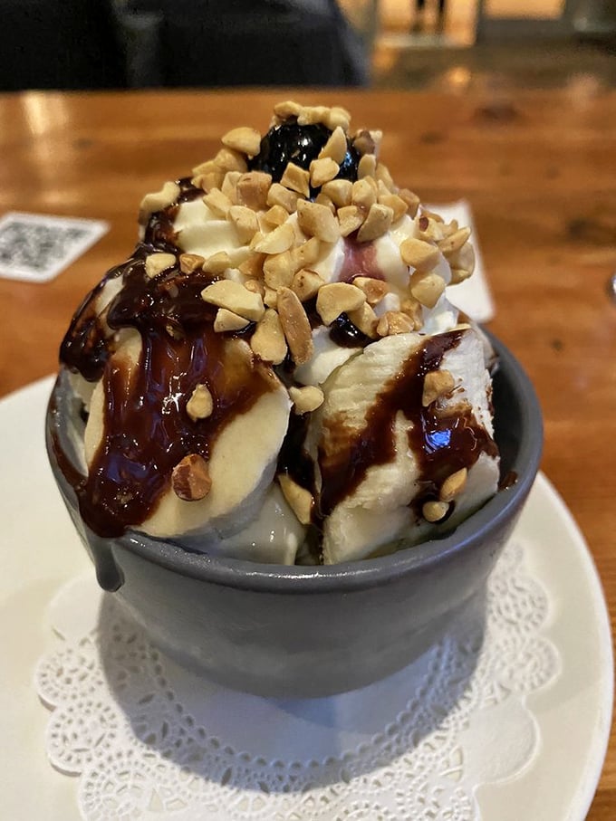 Ice cream topped with warm fudge and nuts&mdash;proof that sometimes the simplest desserts are the most perfect. Your diet plan just called in sick.