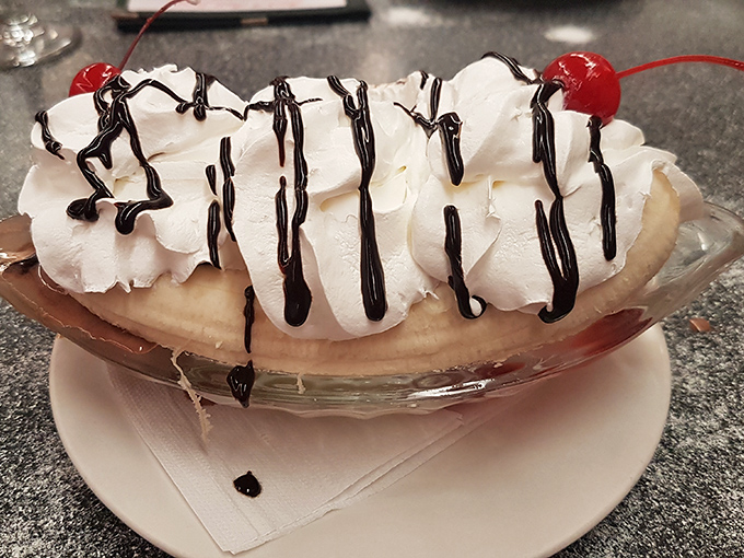 A banana split that's more dressed up than a prom queen! This dessert is ready for its sweet, sweet close-up, Mr. DeMille.