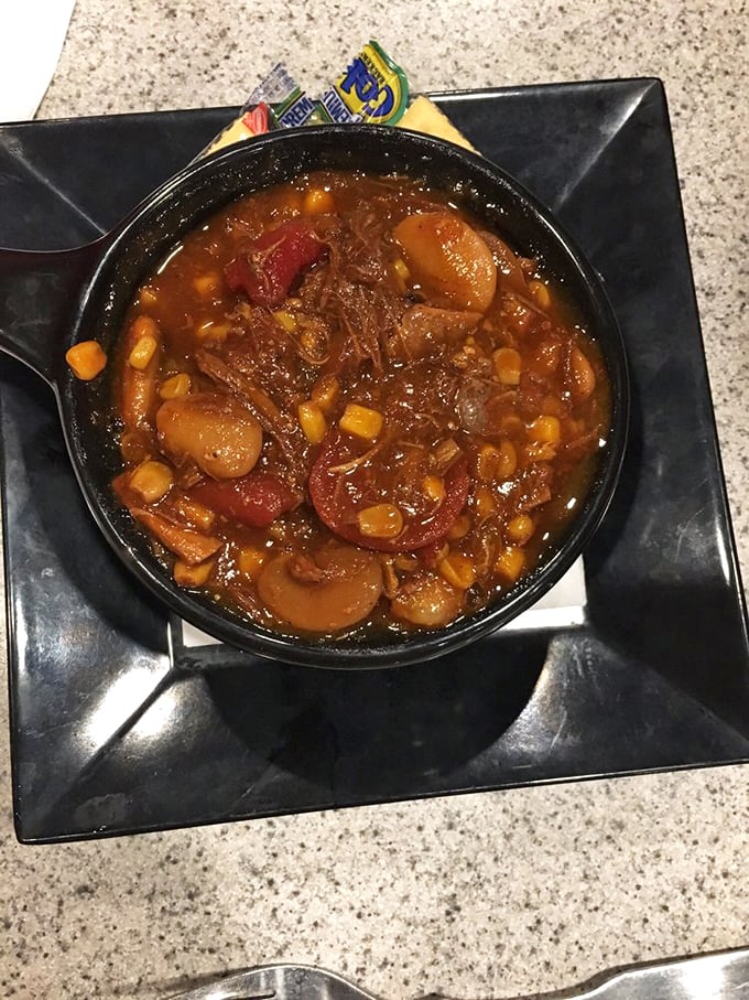 Brunswick stew: the unsung hero of barbecue sides. It's like a warm, savory hug in a bowl, perfect for any weather.