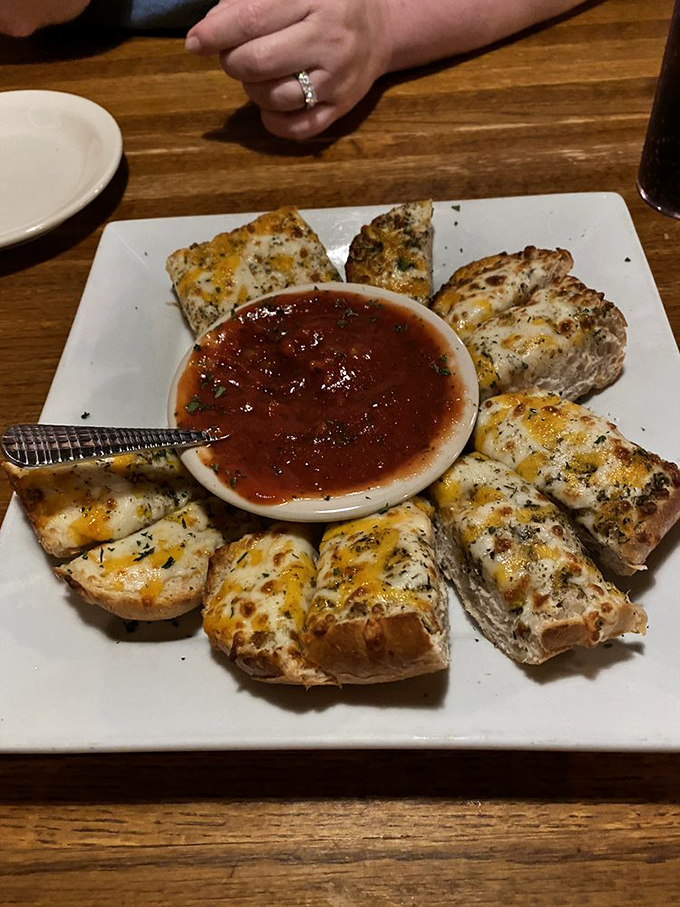 Cheese bread that's more pull-apart than the cast of a soap opera. Warning: may cause spontaneous happiness and cheesy grins.