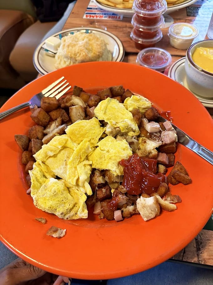 A skillet that's seen more action than a Hollywood blockbuster. Eggs, potatoes, and enough toppings to feed a small army.