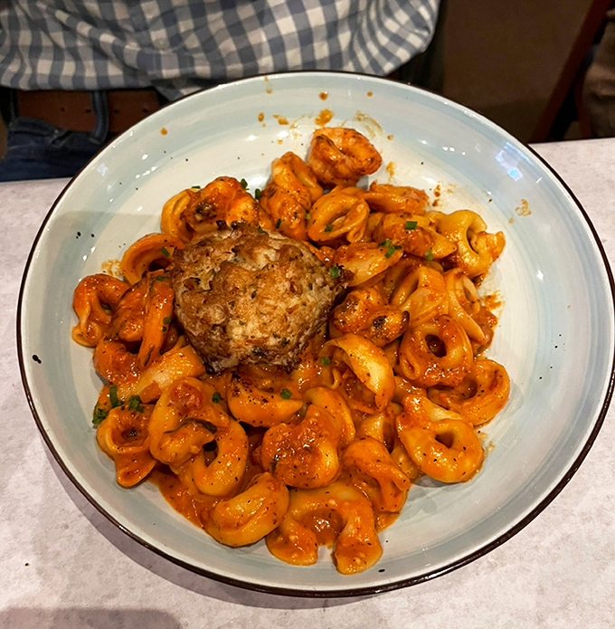 That crab cake is so packed with meat, it's practically doing bicep curls on your plate. Maryland, eat your heart out!
