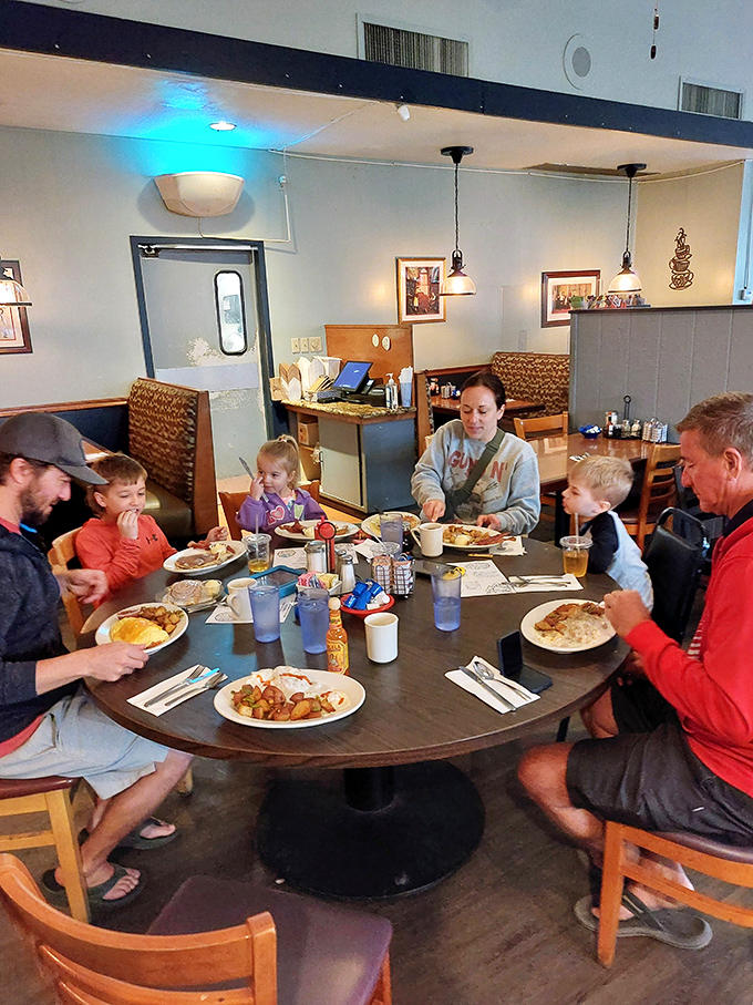 Family, food, and fun &ndash; the holy trinity of dining out. This table scene captures the essence of Village Kitchen's warm atmosphere.