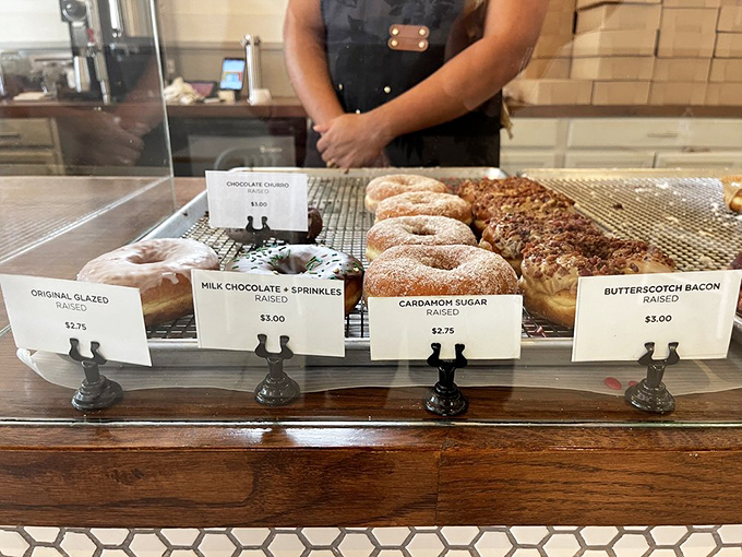 Behind this glass lies a world of sweet possibilities. It's like Willy Wonka's factory, but with more sprinkles.