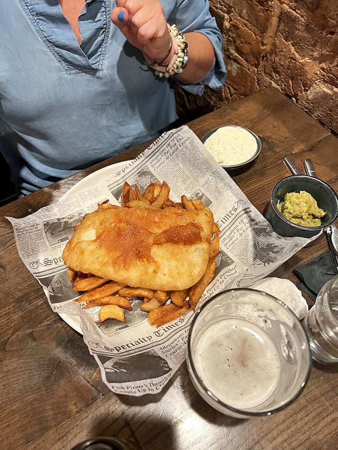 Fish and chips: the ultimate British comfort food. Crispy, flaky, and served on newsprint &ndash; it's like getting a delicious history lesson with every bite.