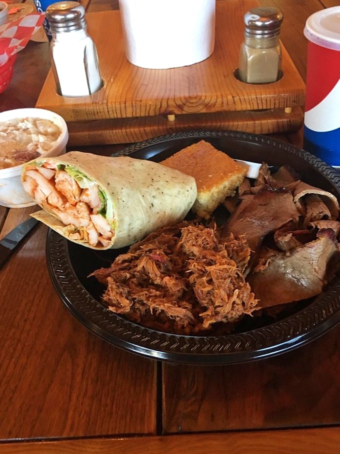 The sampler plate that answers the eternal question: "Why choose one when you can have it all?" That cornbread is the golden ticket to happiness.