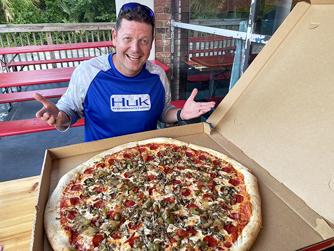 Talk about pizza to go! This box is so big, you might need to strap it to the roof of your car.