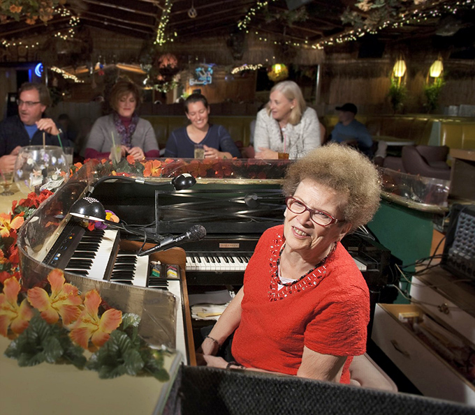 They say music soothes the savage beast, but here it livens up the party! This piano player's got the keys to your heart and your dancing shoes.