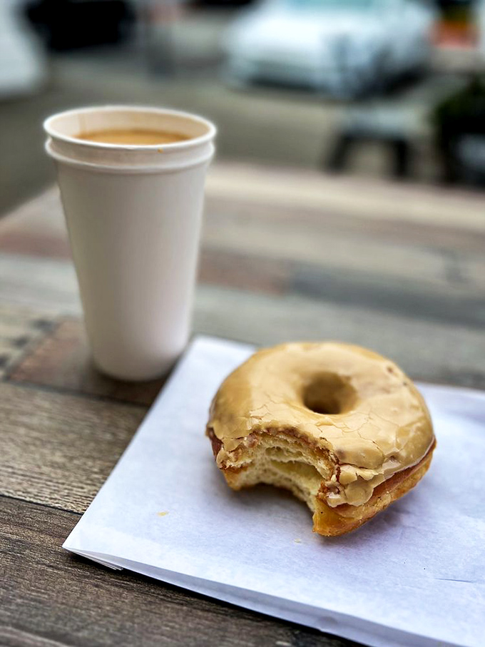The classic combo that dreams are made of. This maple donut and coffee duo is like the Batman and Robin of breakfast.