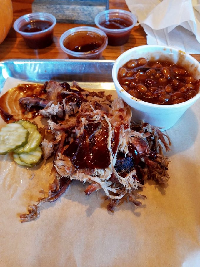 Pulled pork perfection! This sandwich is so packed with juicy, tender meat, it's like a piggy pi&ntilde;ata exploded on your plate. In the best way possible, of course.