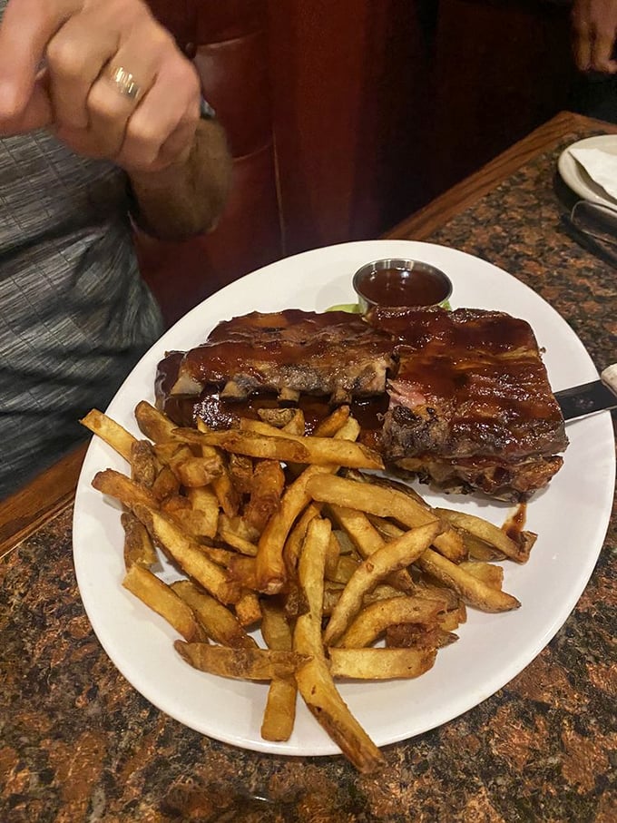 Ribs that require no GPS to find the meat&mdash;fall-off-the-bone tender with fries that deserve their own fan club.