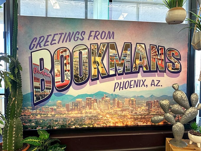 Greetings from book paradise! This postcard-perfect sign captures the essence of Bookmans &ndash; where Phoenix's skyline meets a sky-high stack of stories.