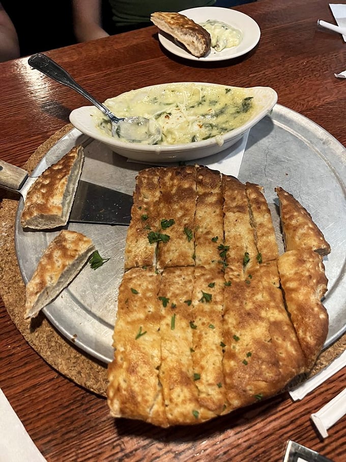Spinach and Artichoke Dip: The unsung hero of appetizers. It's like a warm, cheesy hug for your taste buds, with garlic bread soldiers standing by.