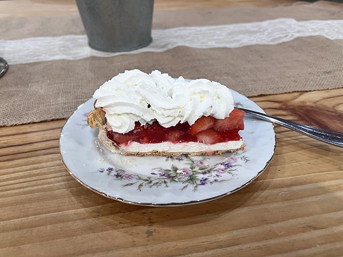 A slice of strawberry heaven! This pie looks so fresh and delicious, it could make a grown man weep with joy.