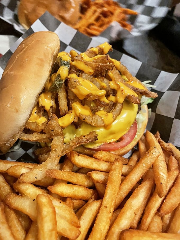 Thunder-ous applause for this burger! It's stacked higher than your grandkid's Lego tower and twice as impressive.