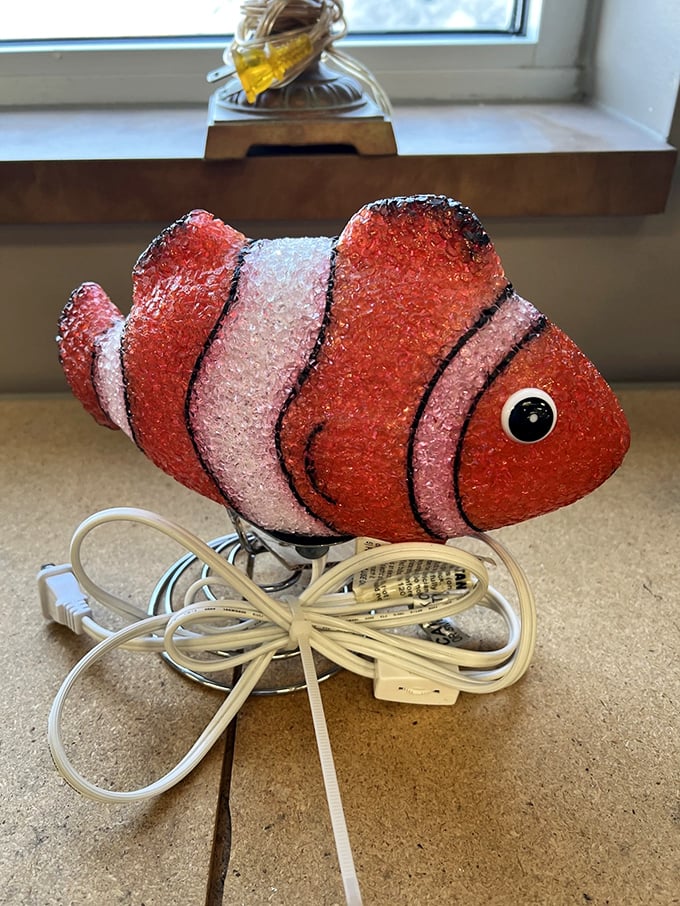 Finding Nemo's long-lost cousin? This glowing fish lamp is swimming with retro charm and kitschy appeal.