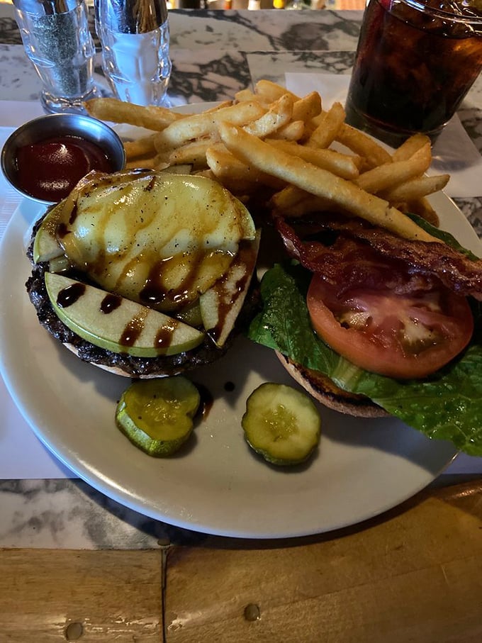 Burger bliss with a side of fries! This isn't just fast food; it's a slow dance of flavors that'll make your taste buds swoon.