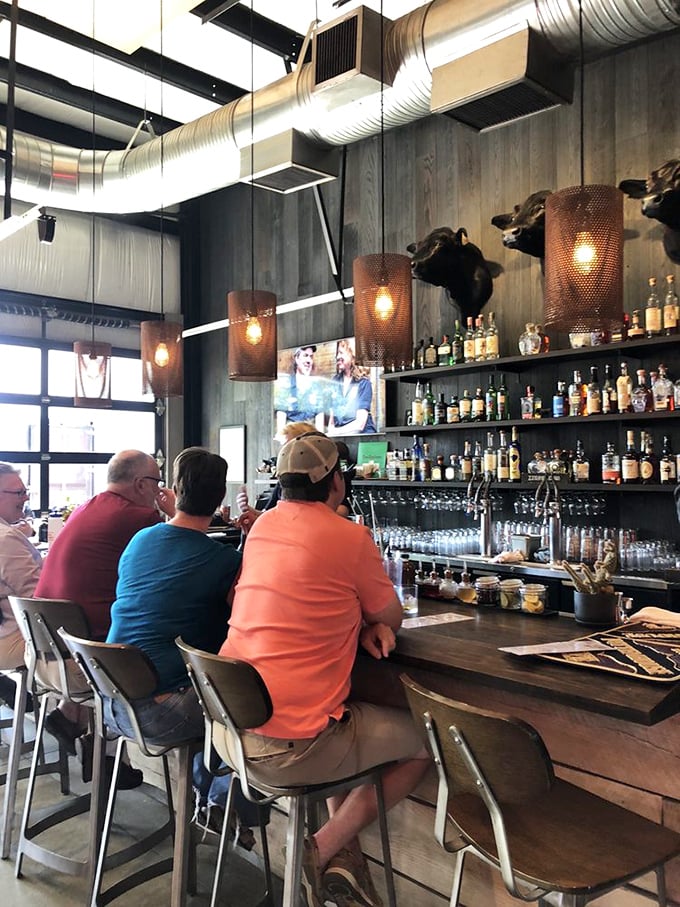 The bar at ZZQ isn't just serving drinks&mdash;it's providing the perfect liquid companions for your meat journey. Bourbon and brisket: a match made in heaven.