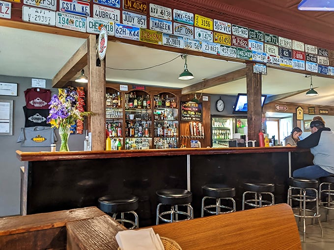 At this bar, everyone knows your name... or they will by the time you finish your burger. It's "Cheers" meets "Man vs. Food."
