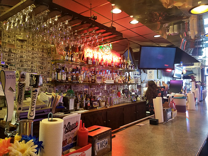 Belly up to flavor central! This well-stocked bar is like an adult candy store, promising liquid courage to tackle those massive burgers.