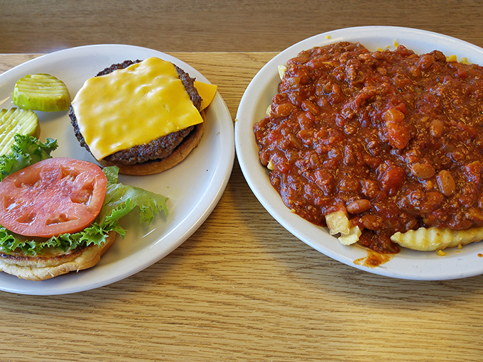 Chili fries and a burger: the dynamic duo of diner delights. It's comfort food that hugs your soul and high-fives your taste buds.