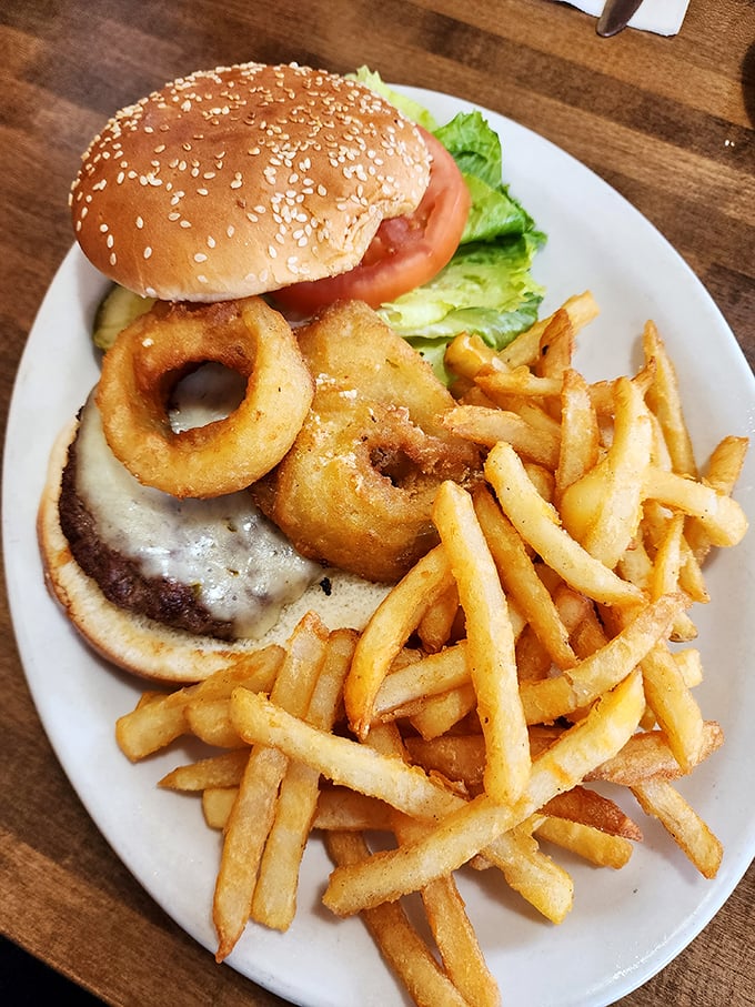 Behold, the all-American power couple: burger and fries. This dynamic duo is ready to rock your taste buds and challenge your belt notch.