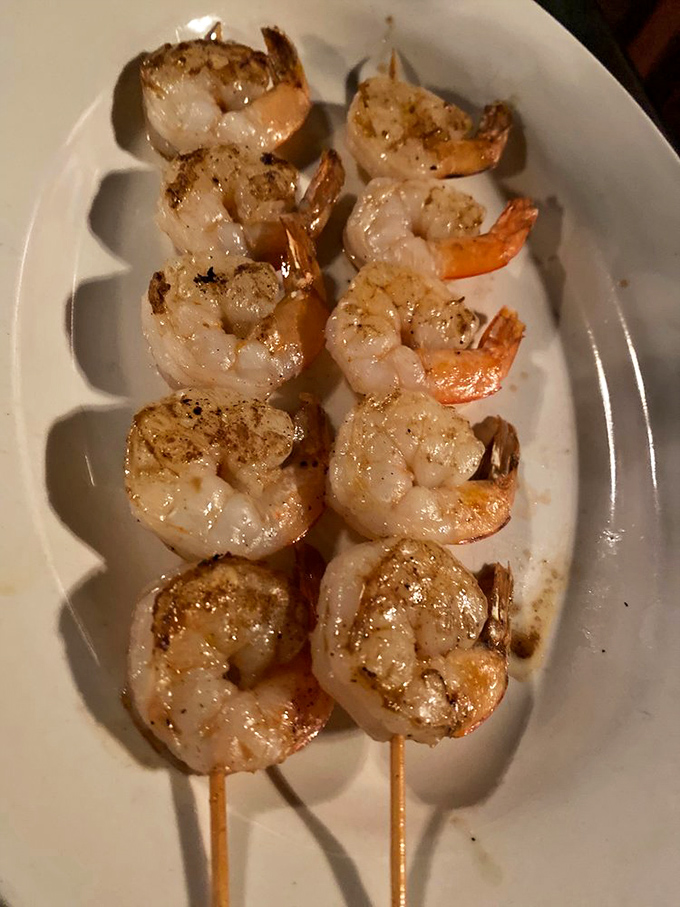 Surf's up in cattle country! These butter-basted shrimp skewers are like little life rafts in a sea of beef.