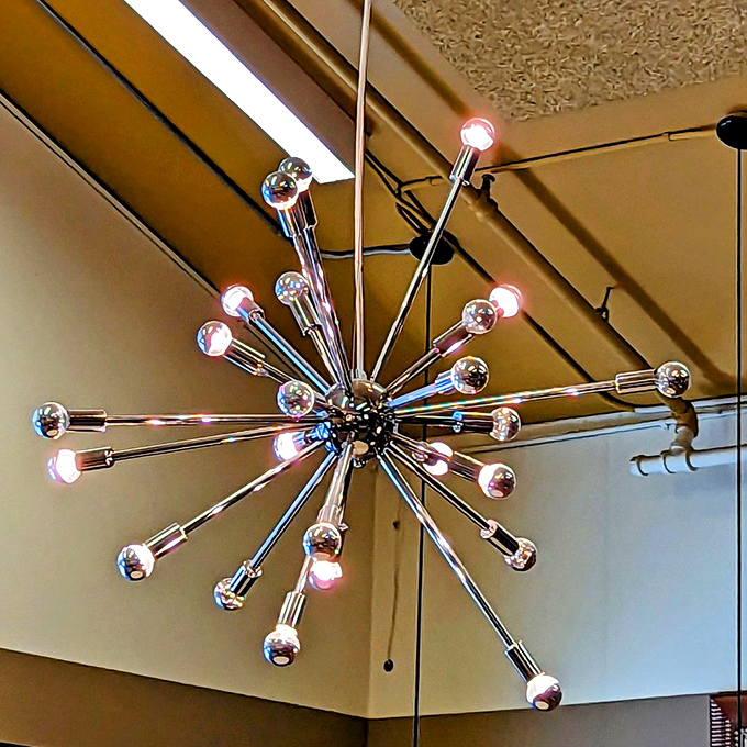 That mid-century modern light fixture isn't just illuminating the room—it's announcing "this place has style" without saying a word.