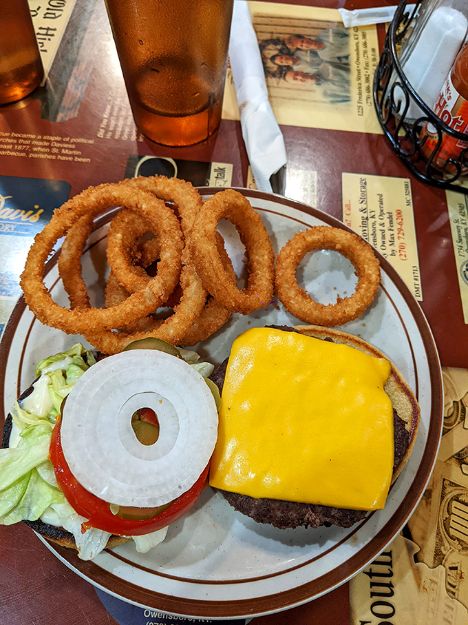 This isn't just a cheeseburger; it's proof that Old Hickory respects the classics, with those golden onion rings standing guard like delicious sentinels.