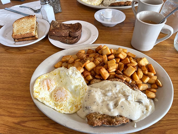 Chicken Fried Steak: Because sometimes, you need to start your day with a food hug. This plate is pure, unadulterated breakfast bliss.