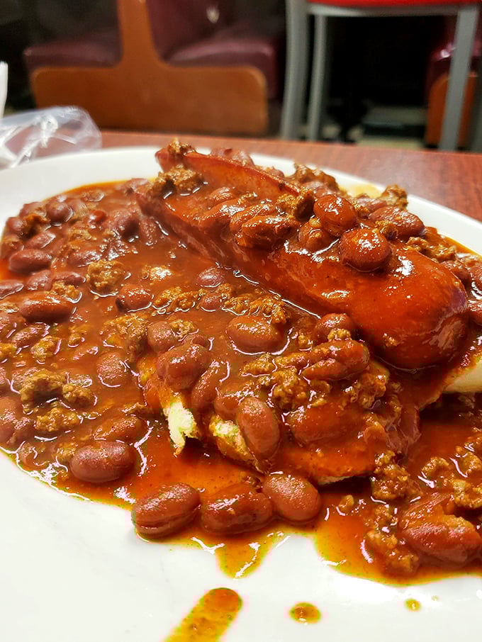 Chili dog alert! This bad boy is messier than a toddler's art project, but twice as delicious. Napkins are your new best friend.