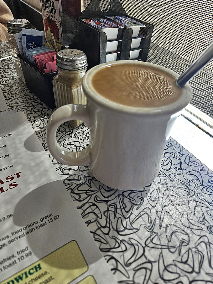 The elixir of life, served in a no-nonsense mug. This coffee doesn't just wake you up; it gives you a pep talk too.