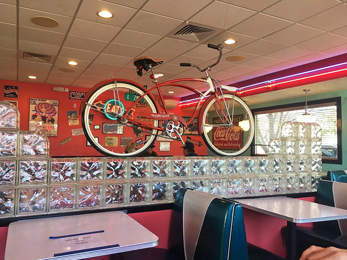 That vintage bicycle isn't compensating for poor food—it's genuine Americana hanging above booths where decades of Wyoming stories have been shared over pie.