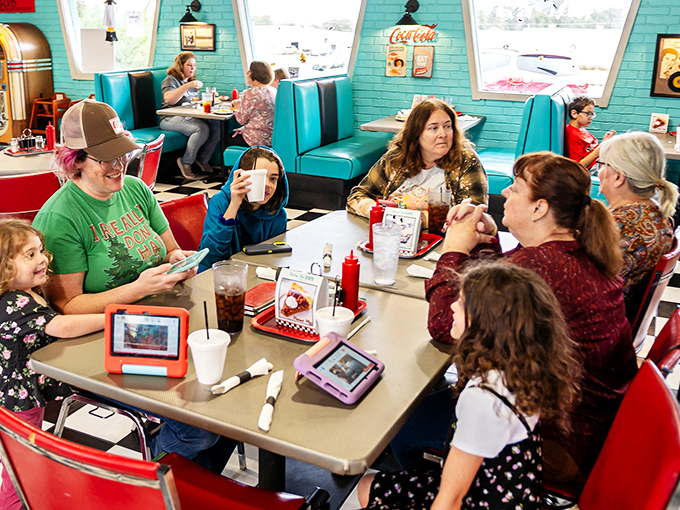 It's not just a meal, it's a social event! This bustling dining room is where families gather, friends catch up, and strangers become neighbors over a plate of fries.